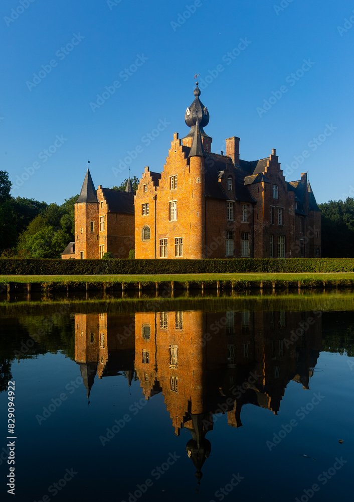 View of historical building of medieval castle in Flemish town of ...