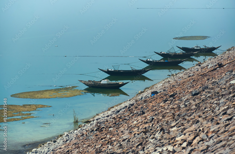 Damodar river, Purulia, West Bengal: row of traditional fishing boats ...