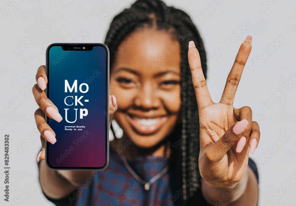 Woman Showing A V Sign With A Phone Mockup Stock Template | Adobe Stock