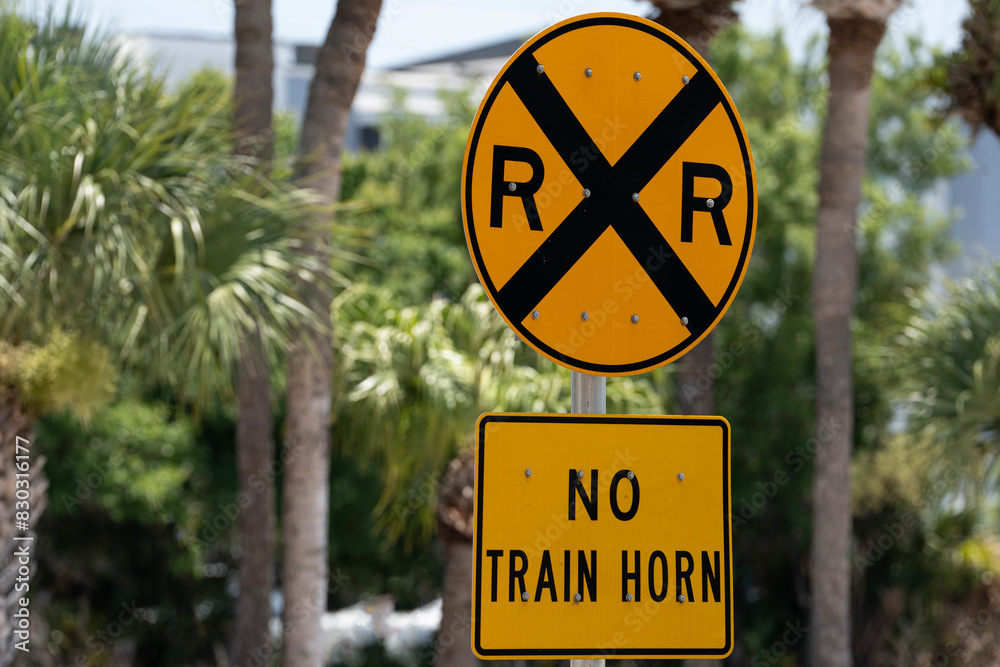 Yellow RailRoad Crossing No Train Horn Safety Sign Near The Tracks ...