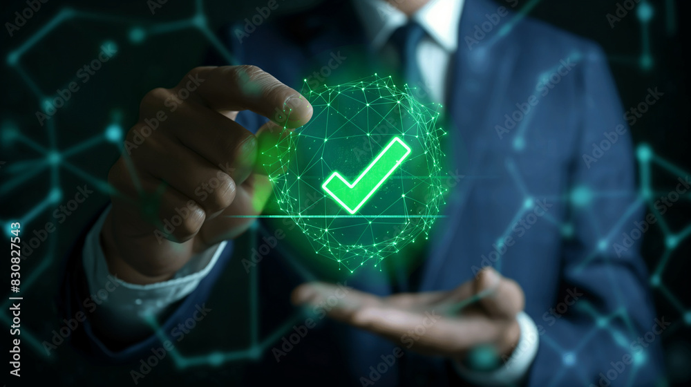 Professional businessman holding a vibrant green compliance tick ...