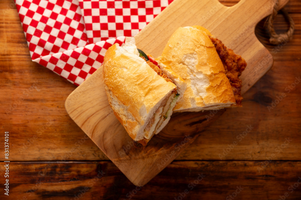 Mexican Torta de Milanesa. Sandwich made with bolillo bread, telera or ...