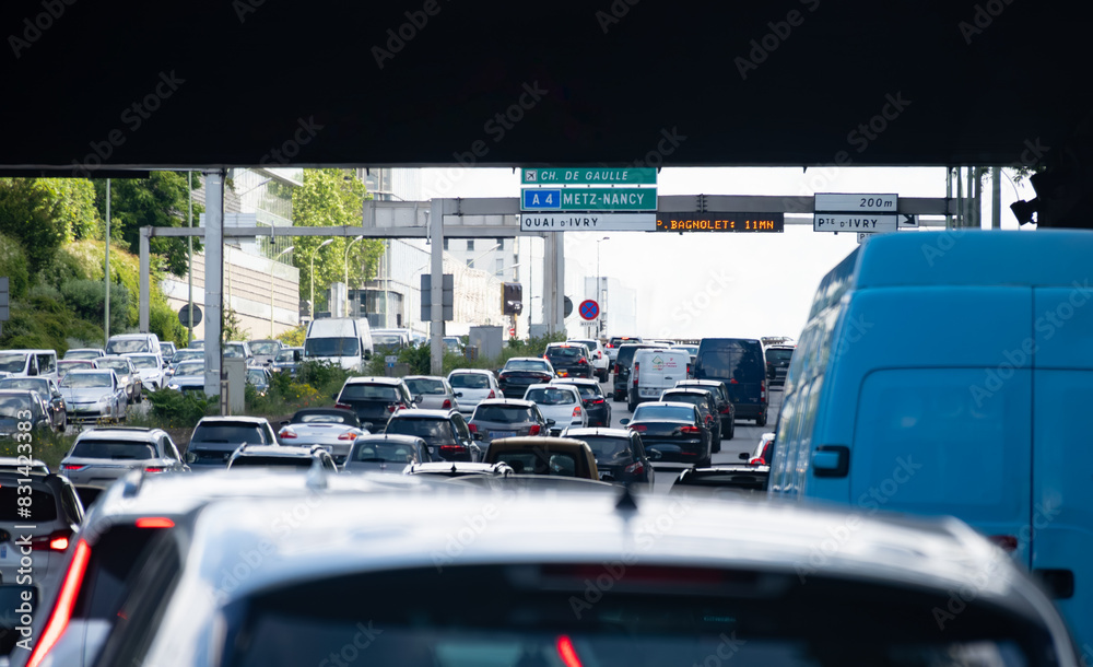 Driving in heavy traffic on ring road of capital of France, traffic jam ...