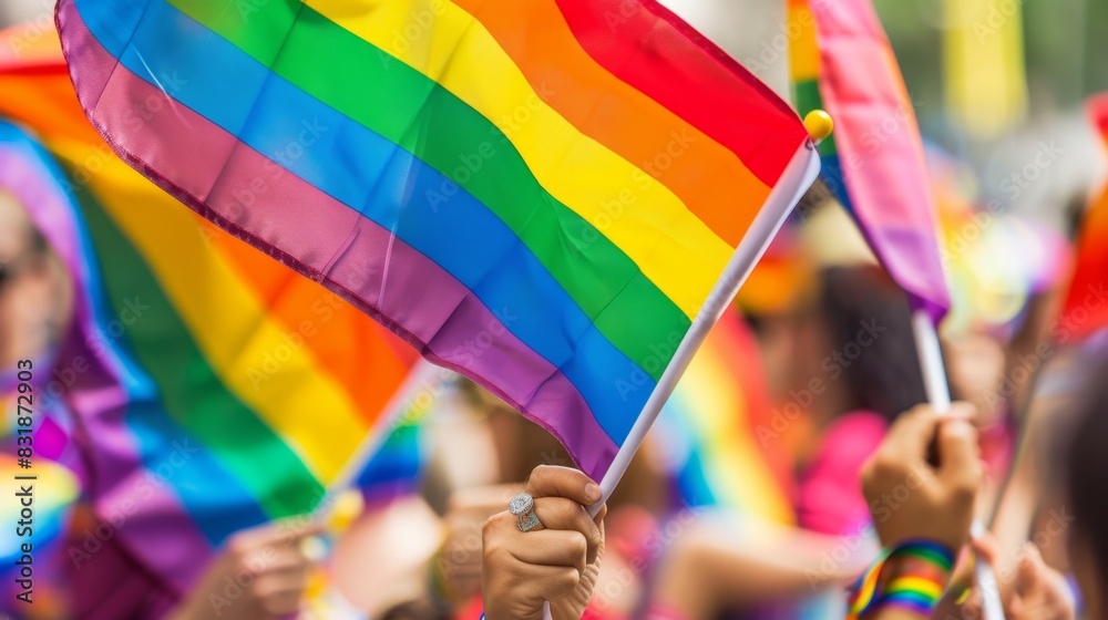 Celebrating LGBTQ Pride Festival - Diverse Friends Holding Rainbow Flag ...
