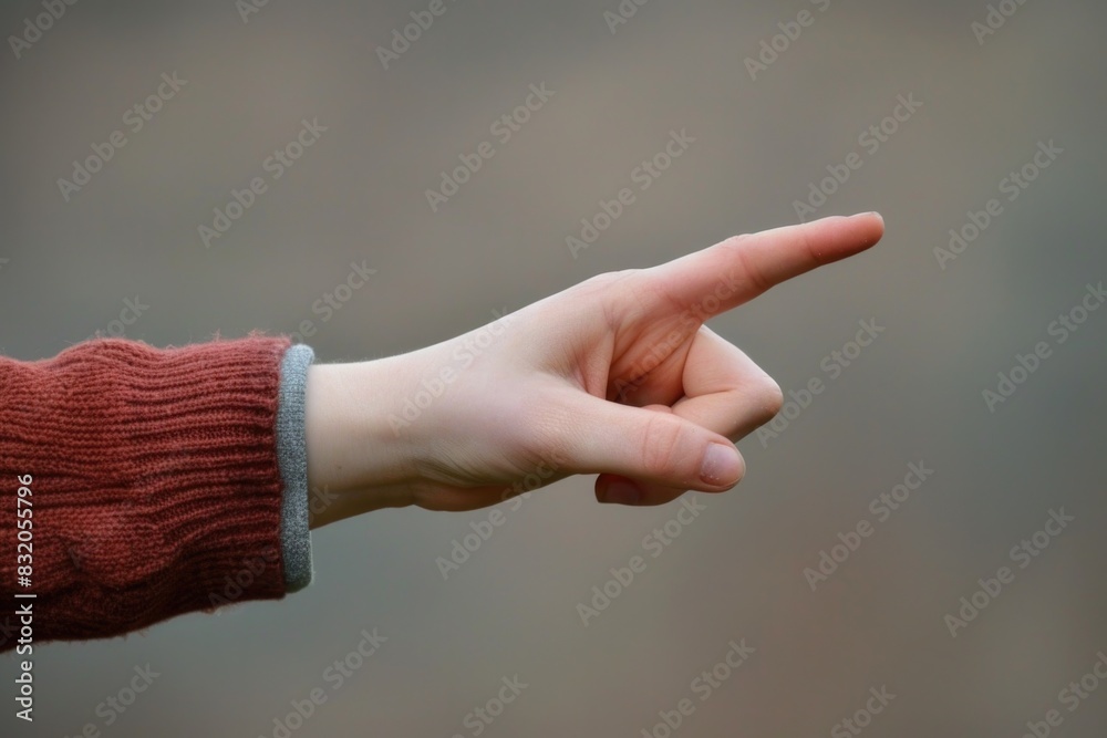 Finger Pointing Hand Gesture. Female Arm Showing Index Finger Gesture ...