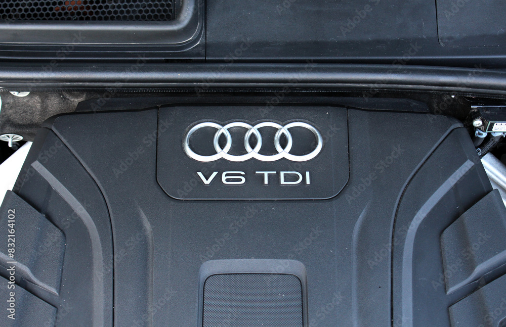 Vinnytsia, Ukraine; May 23, 2024. Audi Q7 engine logo and emblem. Close ...