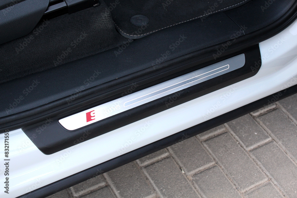 Vinnytsia, Ukraine; May 23, 2024. Audi Q7 S-Line threshold with emblem ...