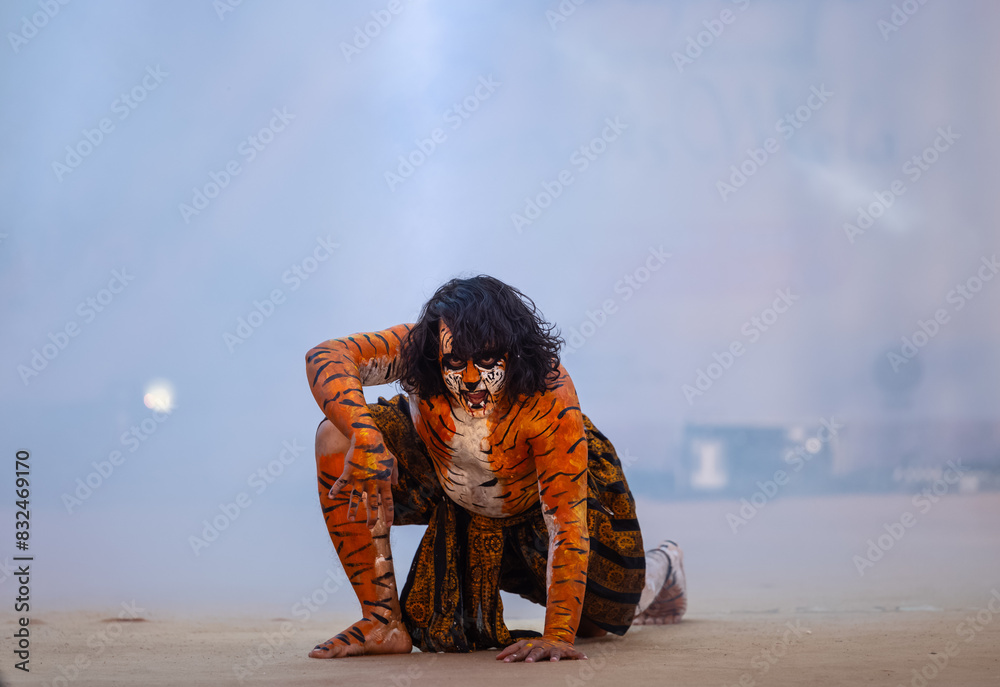 Portrait of an male artist performing classical dance kuchipudi as ...