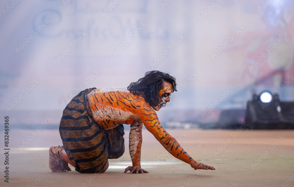 Portrait of an male artist performing classical dance kuchipudi as ...