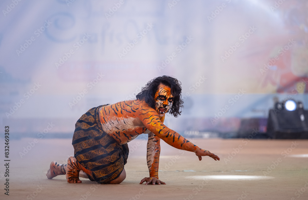 Portrait of an male artist performing classical dance kuchipudi as ...
