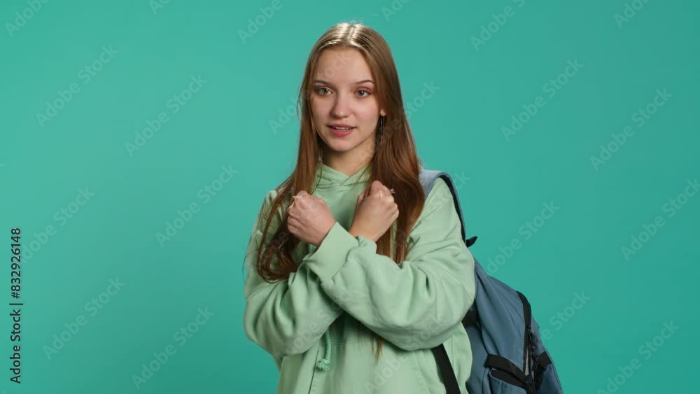Assertive woman shows letter X with arms crossed, staying in warrior ...
