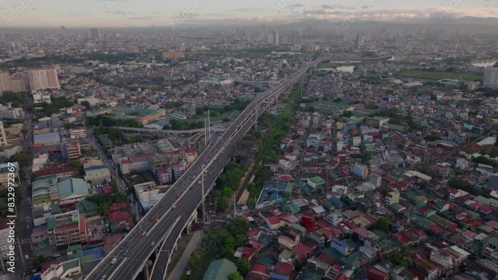 Aerial view of a bustling highway in Manila, Philippines, revealing the ...
