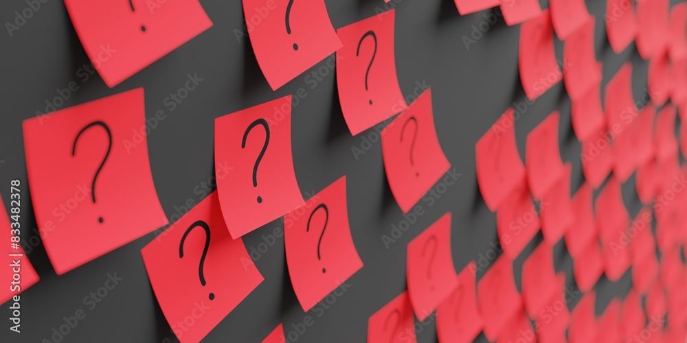 Many red stickers on black board background with question mark symbol ...