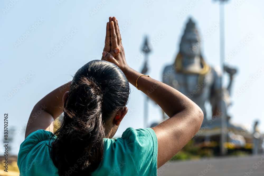A women Devotee Praying at Hindu Temple murudeshwar Stock Photo | Adobe ...
