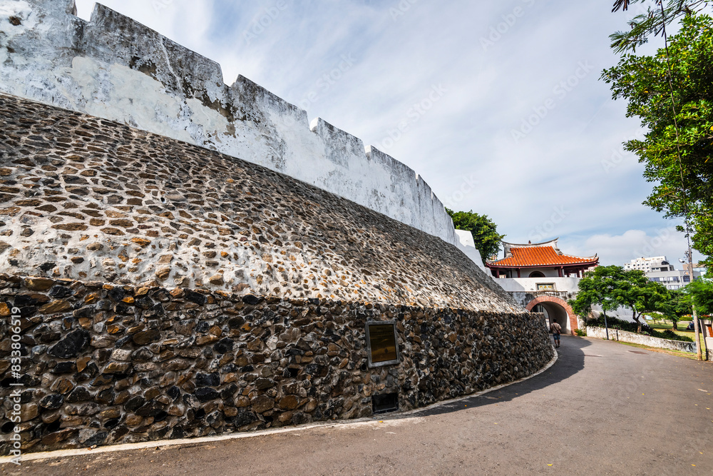 Foto de Penghu, Taiwan- June 18, 2019: Old city wall building view of ...