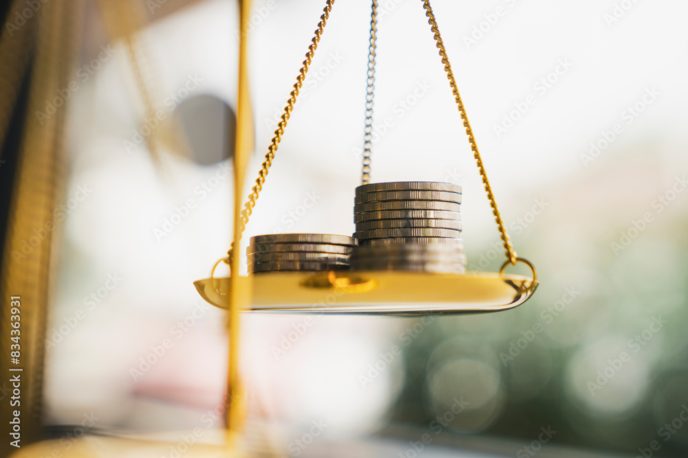 Coins stack with balance scale. Money management, financial plan, time ...