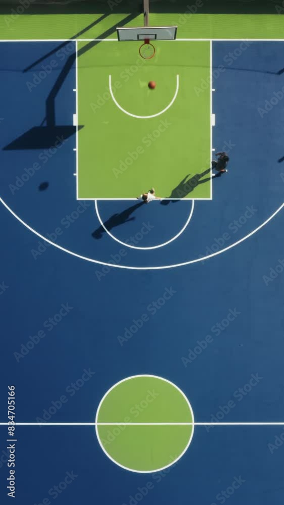 Vertical Screen: Vertical Screen: Aerial footage shows players on a ...