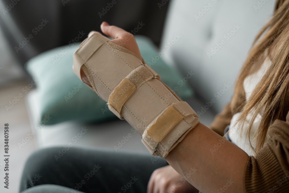 Hand injury. Broken wrist and arm with bandage or immobilizer. woman ...