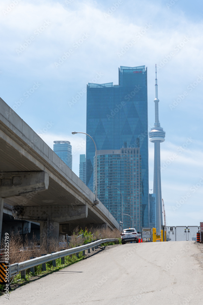 Gardiner Expressway, ramp, and buildings at CIBC Square with CN Tower ...
