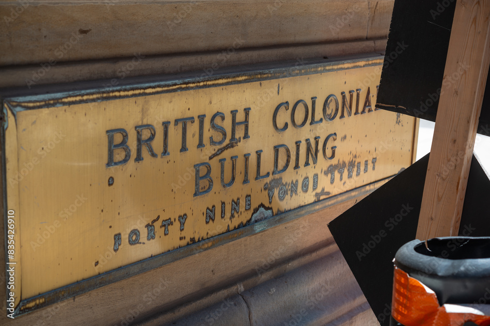 metal name plate and location sign of British Colonial Building, a ...