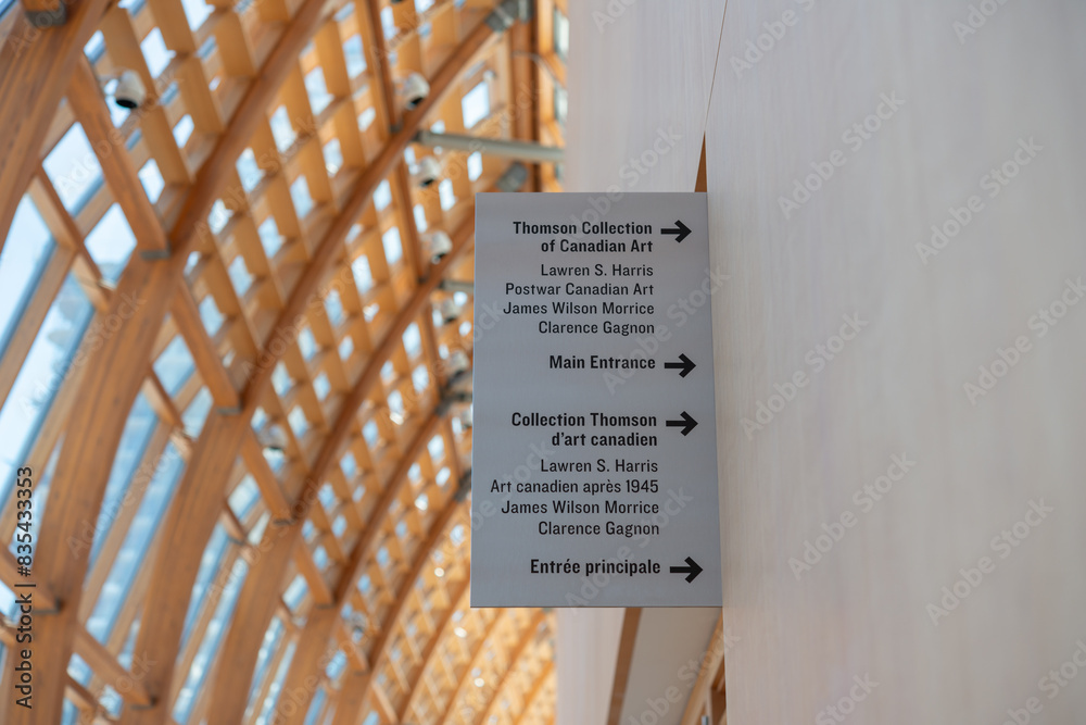 projecting wall sign with direction to various galleries at Galleria ...