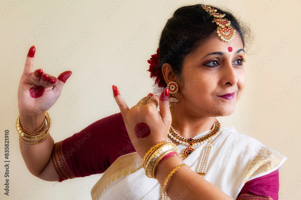 Female Indian classical dancer in close up demonstrating Bharatanatyam ... Female Indian classical dancer in close up demonstrating Bharatanatyam ...