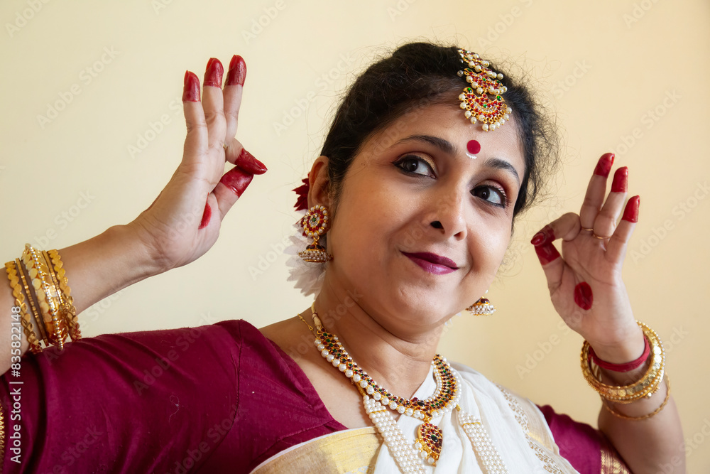Female Indian classical dancer in close up demonstrating Bharatanatyam ... Female Indian classical dancer in close up demonstrating Bharatanatyam ...