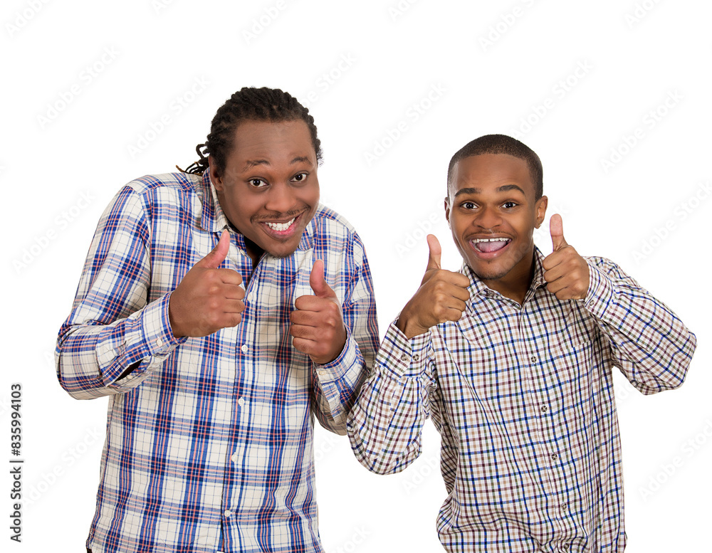 Closeup portrait handsome happy, young men showing two thumbs up sign gesture symbol, isolated ...