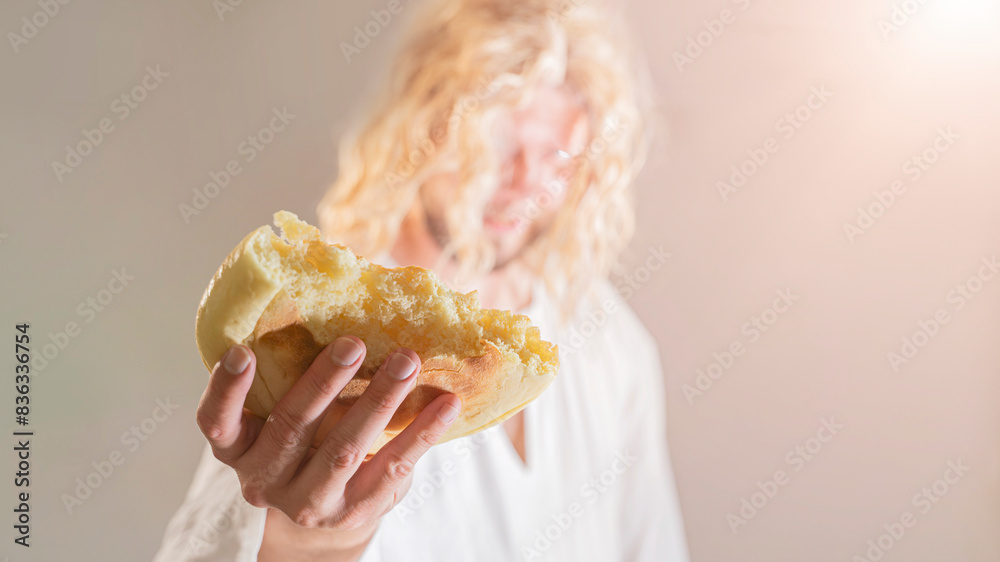 Jesus Christ breaking bread as a symbol of Communion Stock Photo ...