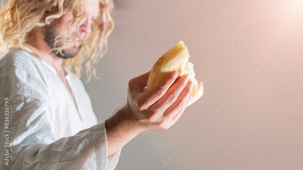 Jesus Christ breaking bread as a symbol of Communion Stock Photo ...