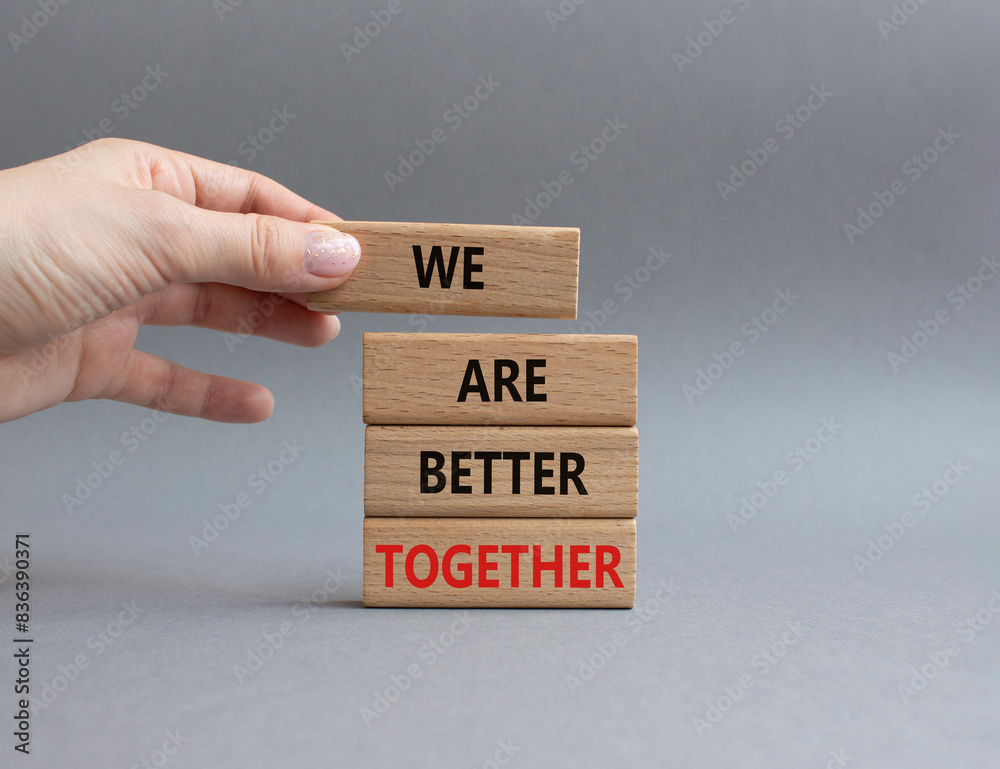 We are better together symbol. Wooden blocks with words We are better ...