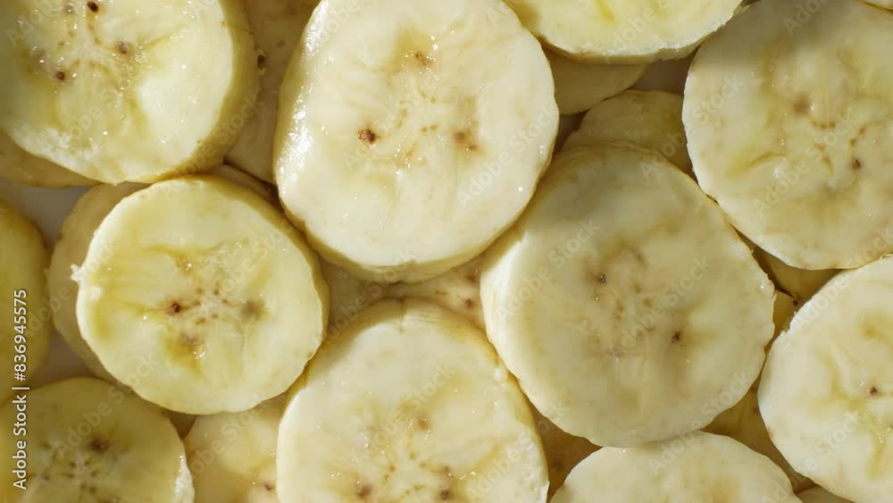 In this intimate view, sliced bananas unveil their luscious interior ...