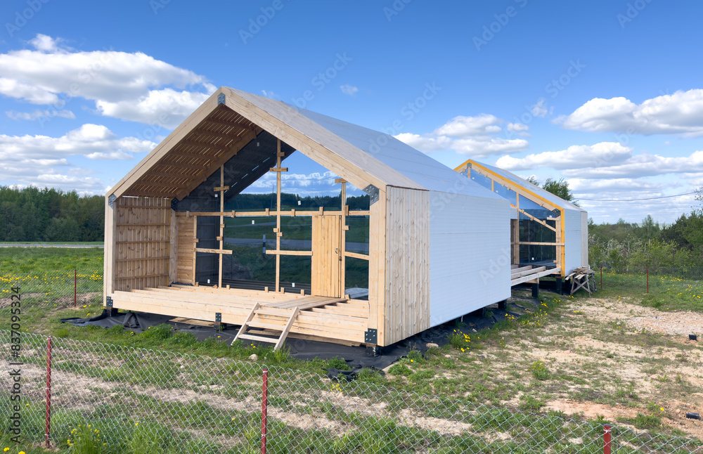 Barn House construction. Barnhouse in countryside. Modern Wooden house ...
