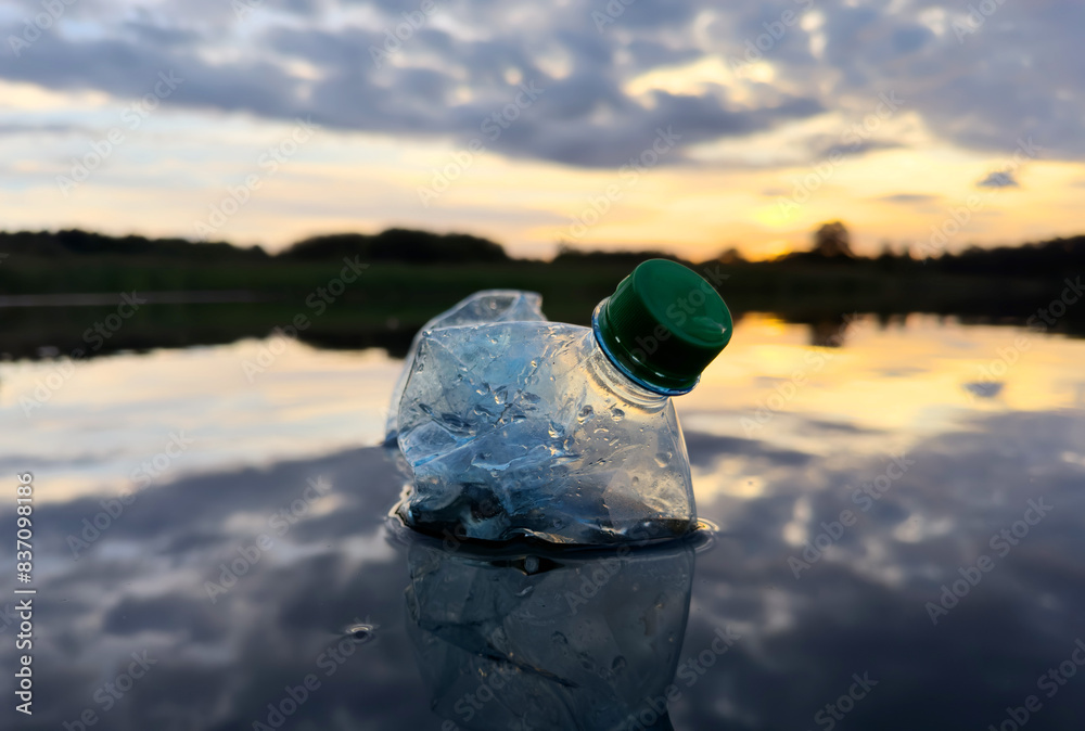 Marine plastic pollution. Plastic waste in lake. Microplastics ...