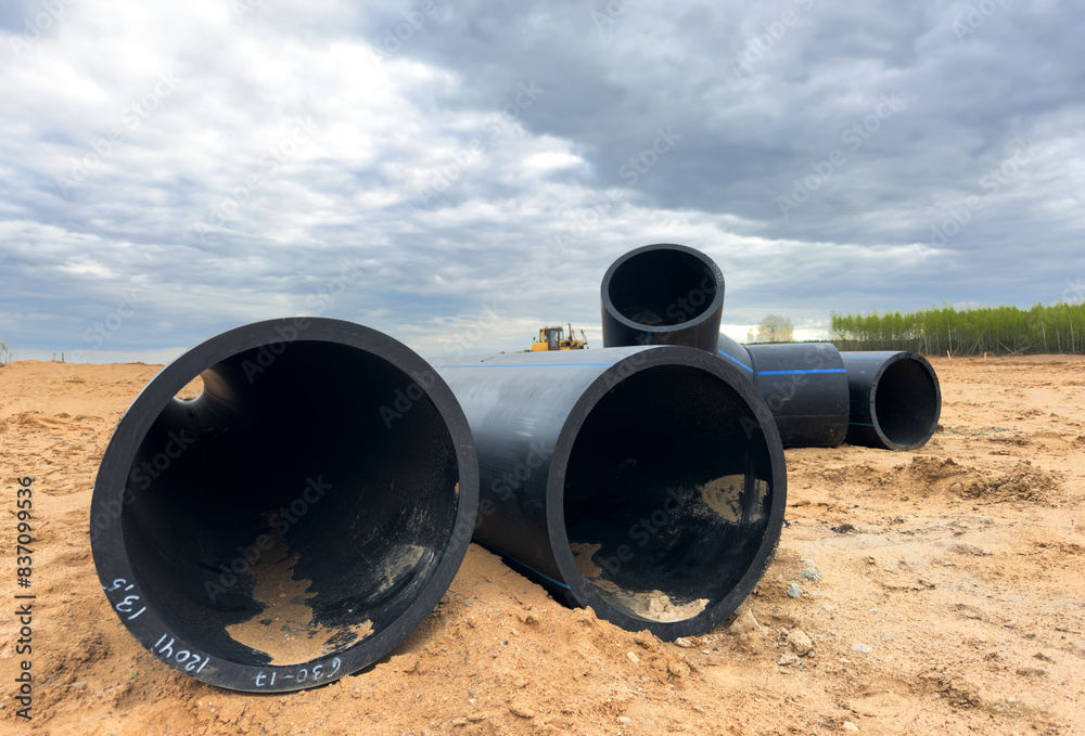 Heating pipes. Laying of underground storm sewer pipes at construction ...