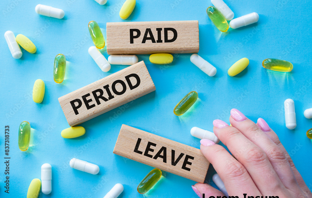 Paid Period Leave symbol. Concept words Paid Period Leave on wooden ...