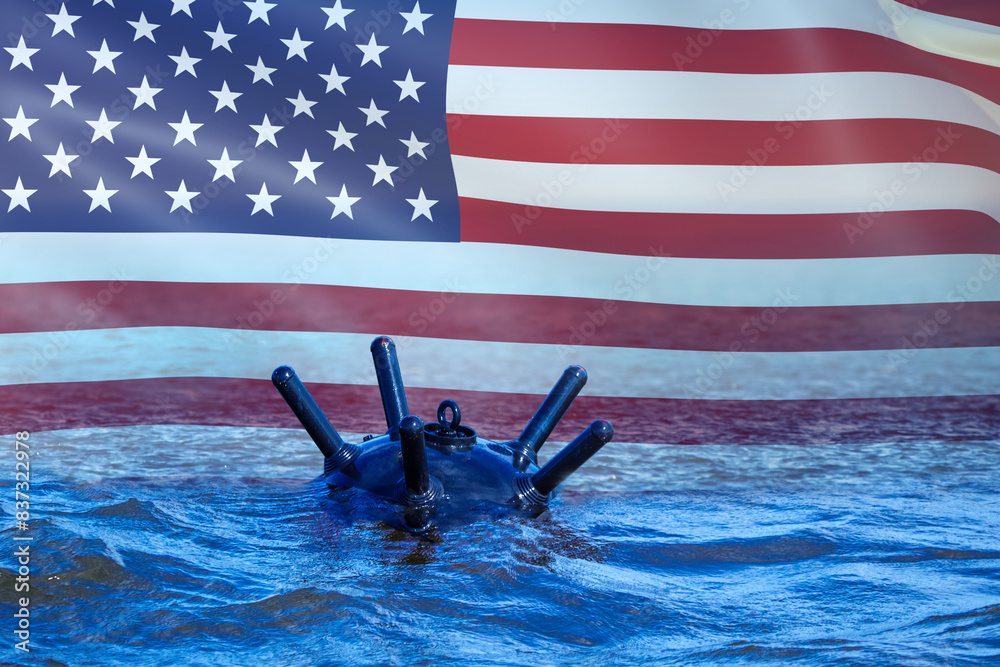 Anti-ship mine floats in water. USA flag. Underwater bomb. End of ...