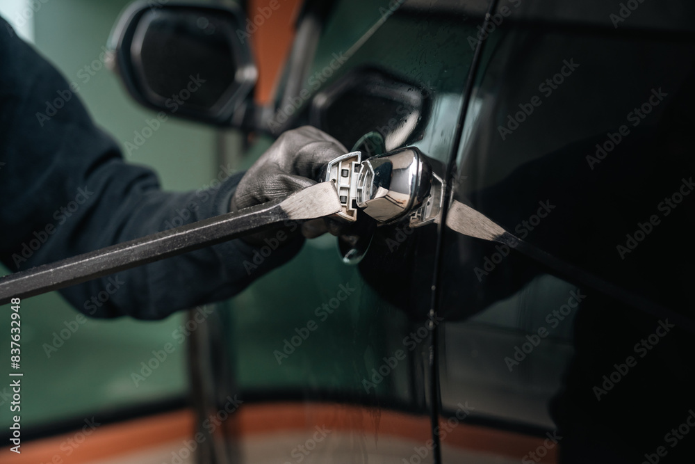 Thief in uniform black jacket various action stolen cars. The Robber ...