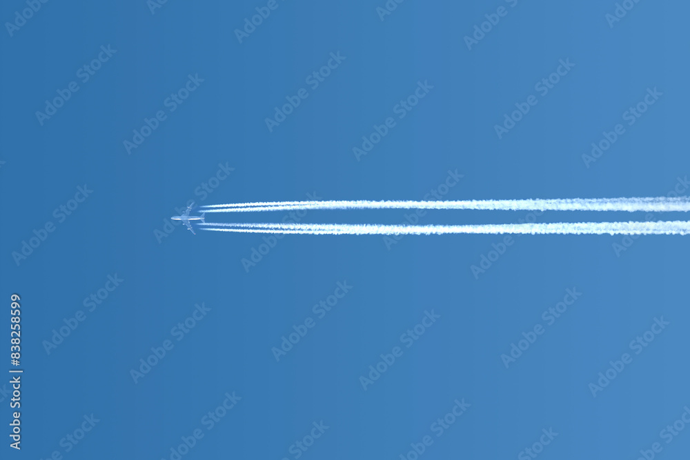 Large four motors passenger supersonic airplane flying horizontally ...