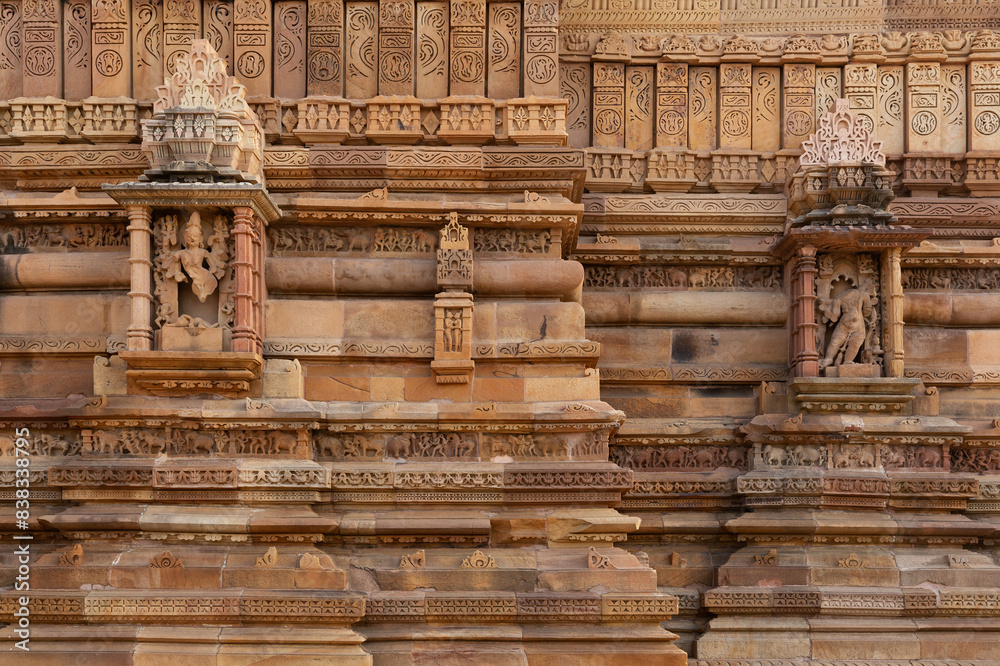 Ancient sculpture remains and intricate designs on the wall of ...