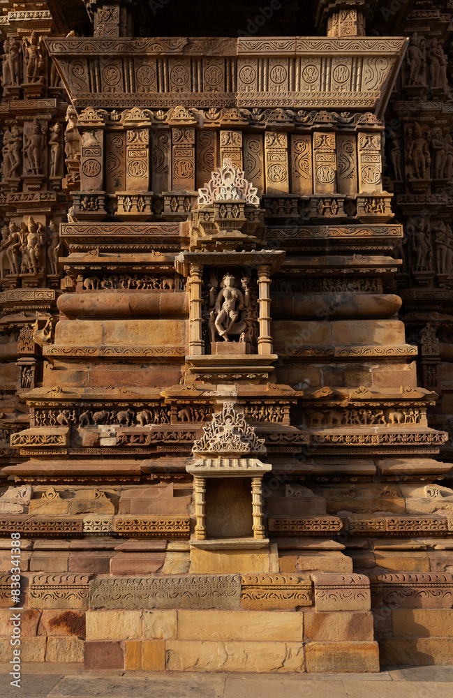 Ancient sculpture and intricate designs on the wall of Kandariya ...