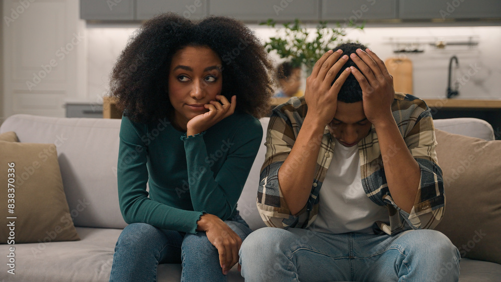 African American ethnic family sad parents father suffering headache ...