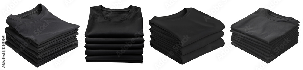 Set of stack and neatly folded t-shirts in black color tone on a ...