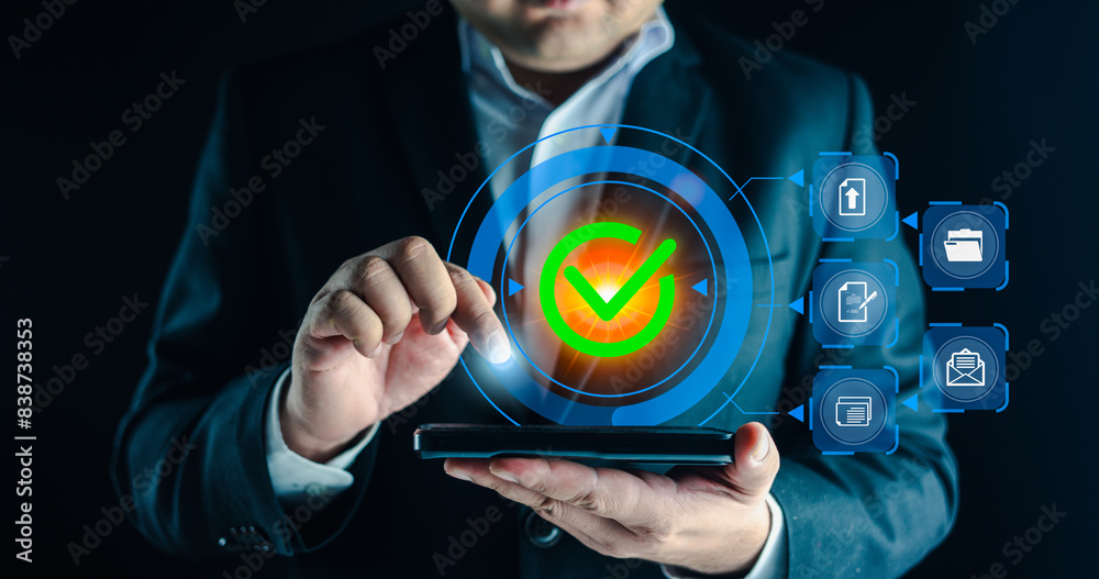 Businessmen touch a virtual glowing correct sign mark and document for ...