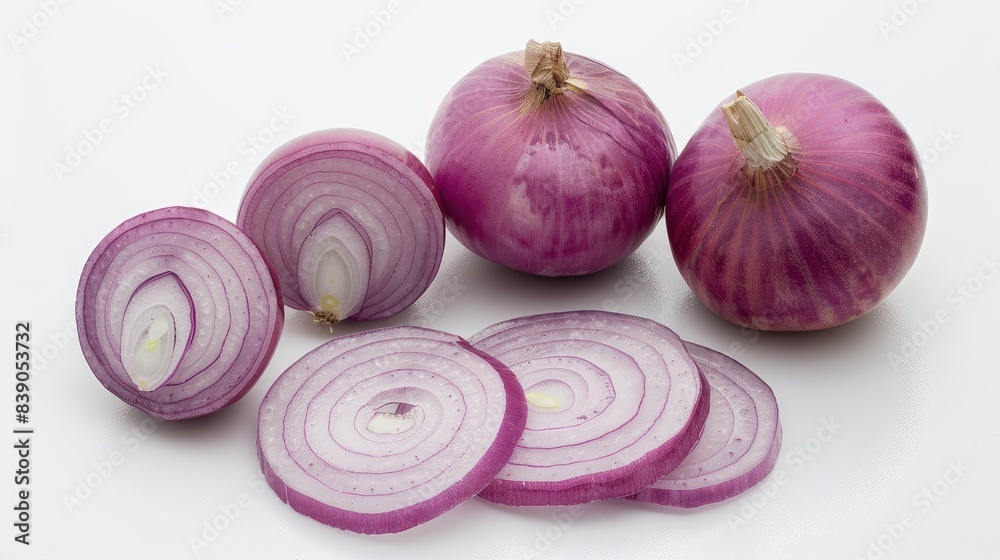 Various onions in both whole and sliced forms on a white background ...