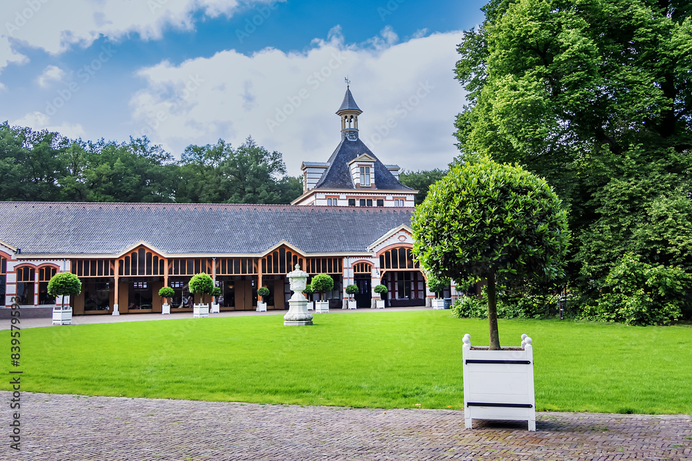 Historic Castle Het Loo. View of Royal Stables, which displays various ...
