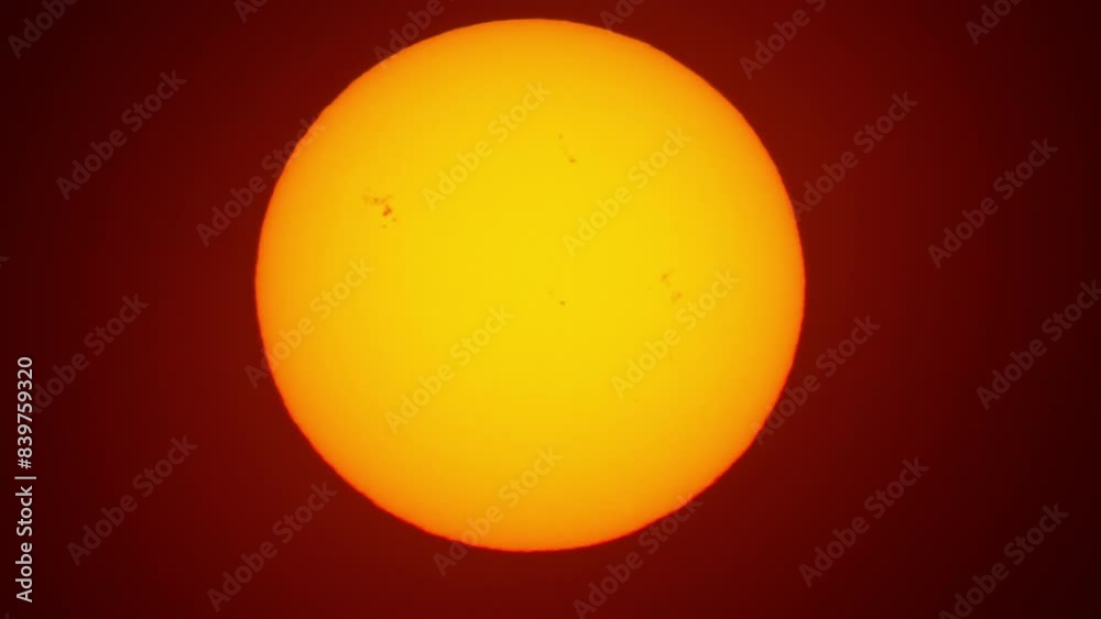 Beautiful clear big sun disk sunset with sun spots. Big red hot sun ...