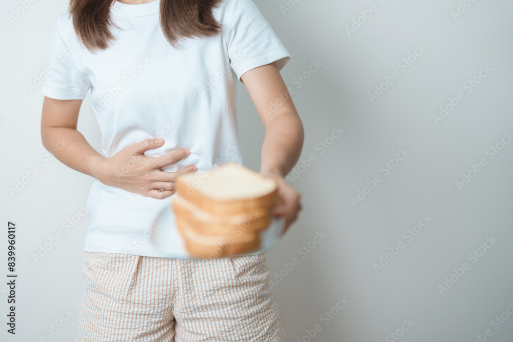 Gluten intolerance, Gluten free and celiac disease or wheat allergy concept. woman hold Bread ...