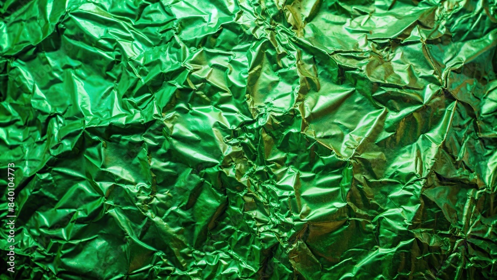 Green foil texture background perfect for adding a touch of luxury and ...