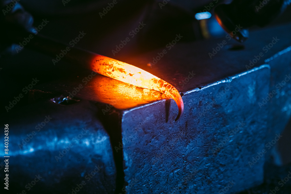Glowing hot metal on anvil in blacksmith's workshop Stock Photo | Adobe ...